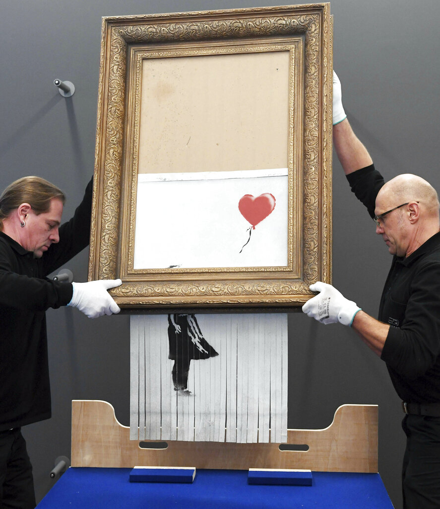 Banksy painting that self-destructed displayed in Germany - Sentinel ...